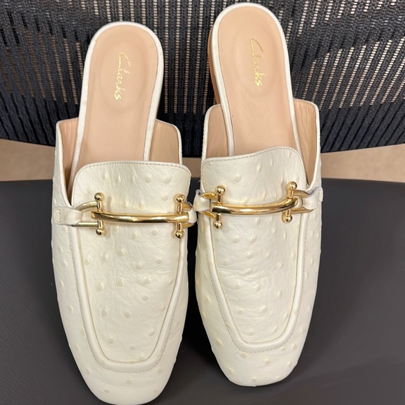 Clarks | Shoes | Clarks Cream Mules With Gold Buckle 65 | Poshmark